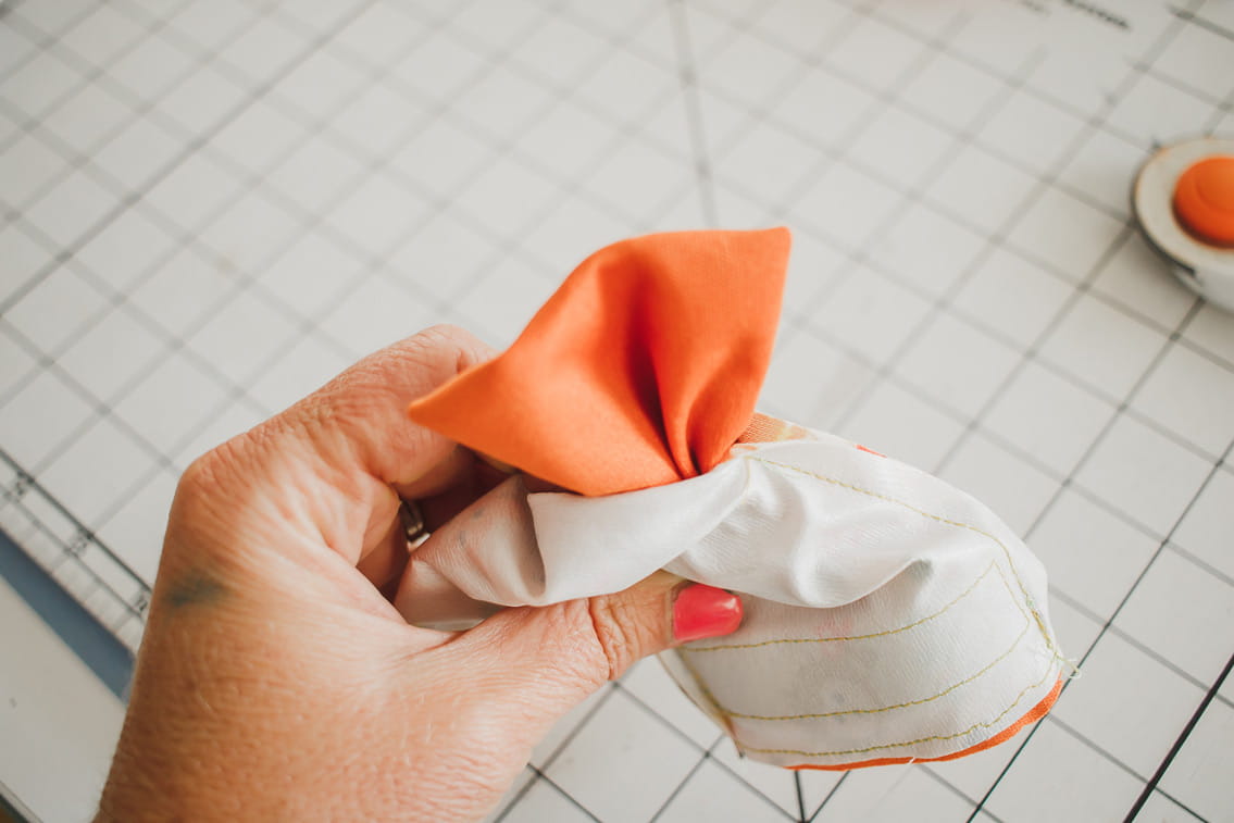 14. Turn the snack bag through the opening in the liner. Pull all the ...